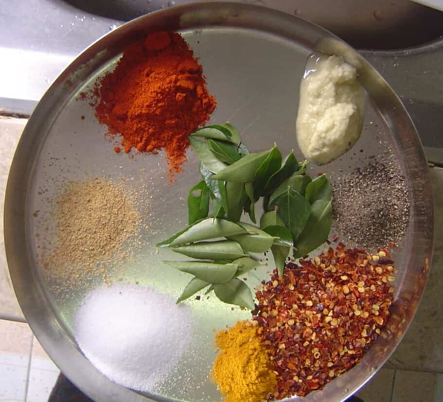 Kerala Spicy Masala Fish Fry | Kerala Meen Porichathu - pachakam.com